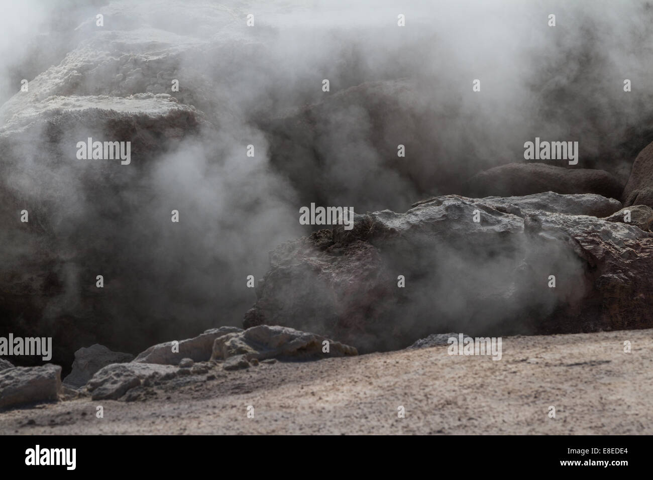 steaming rocks in yellowstone national park back lit by the sun Stock ...