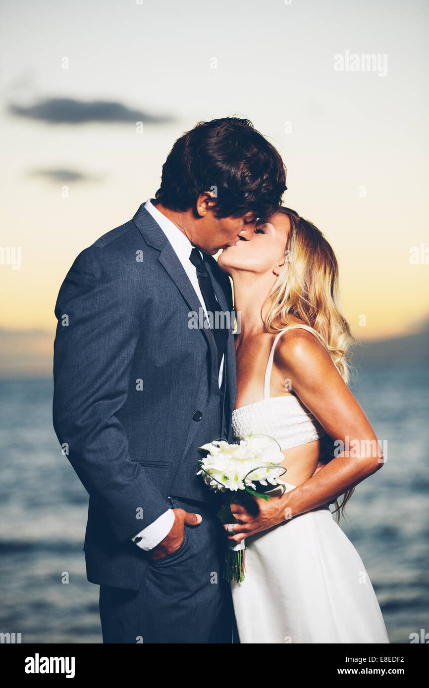 Wedding. Bride and Groom Just Married. Kissing and Embracing Stock ...