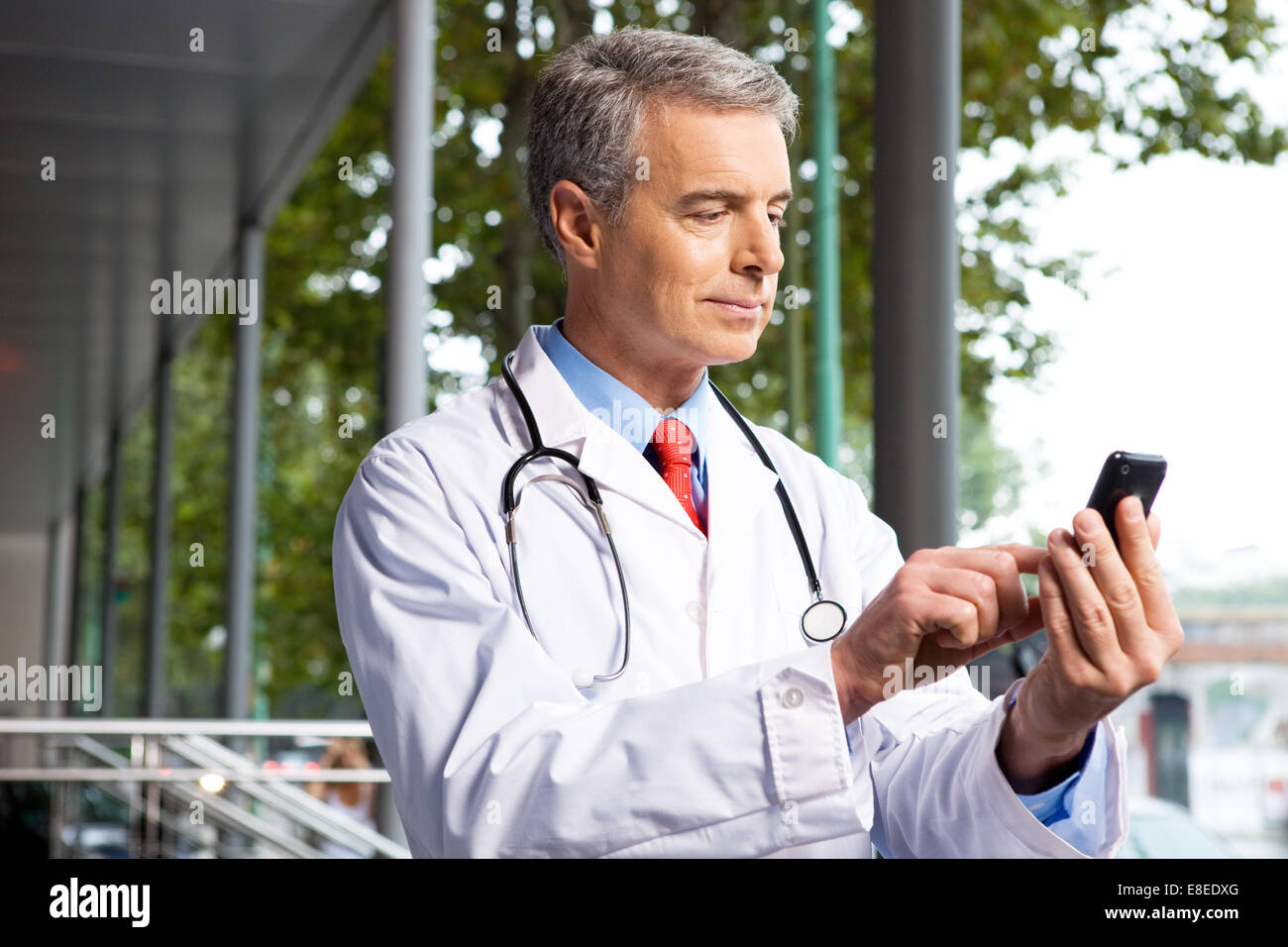 Senior Doctor Making Phone Call High Resolution Stock Photography and ...