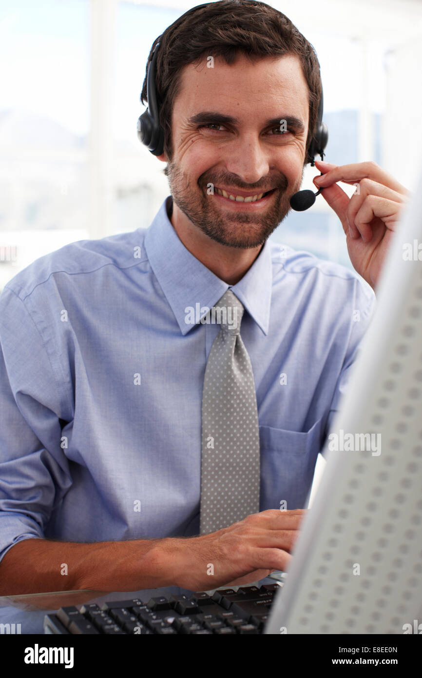 Happy customer service agent Stock Photo - Alamy
