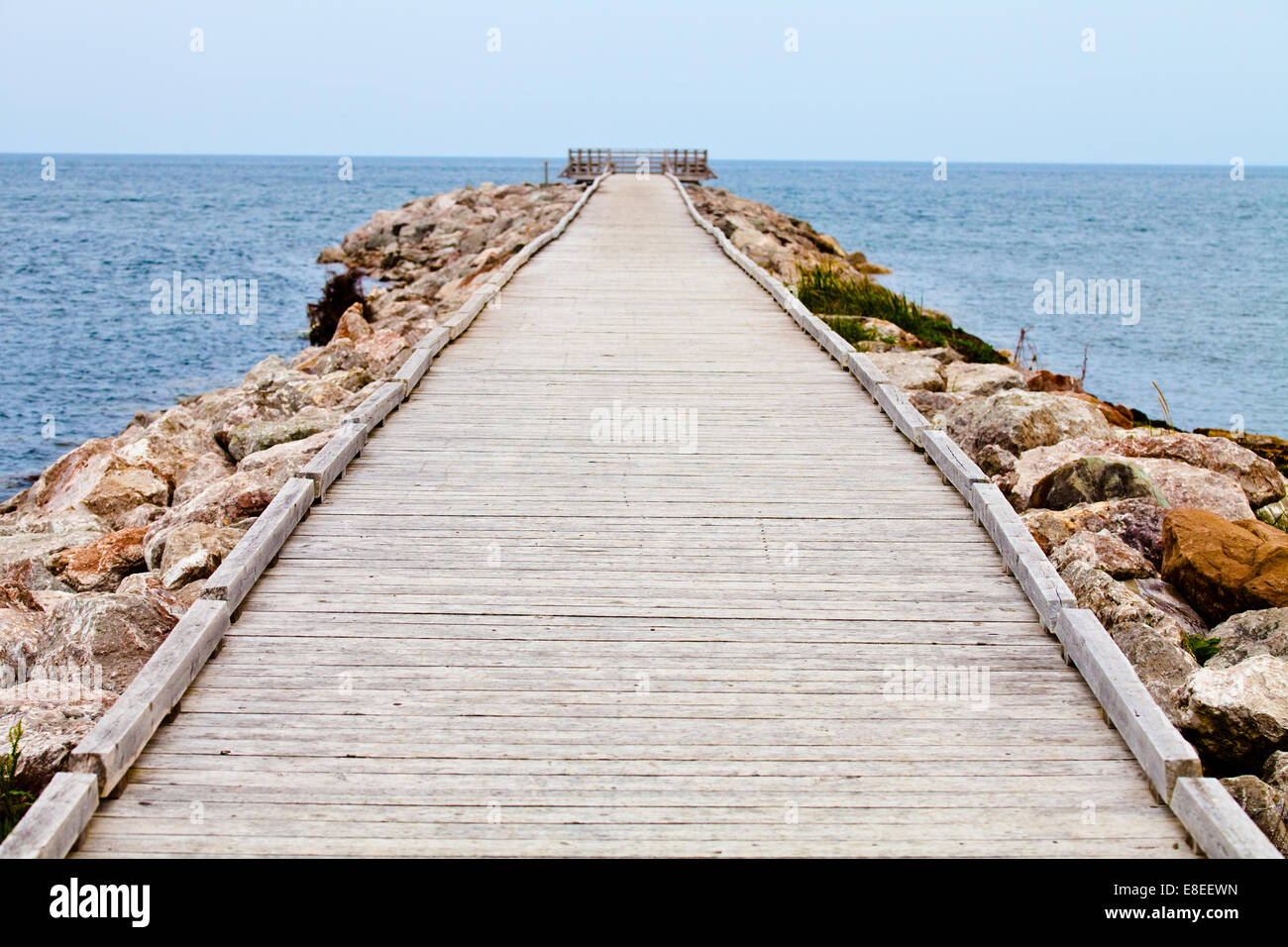 Long Wooden Dock with Observatory and Beautiful View of the Calm Ocean ...