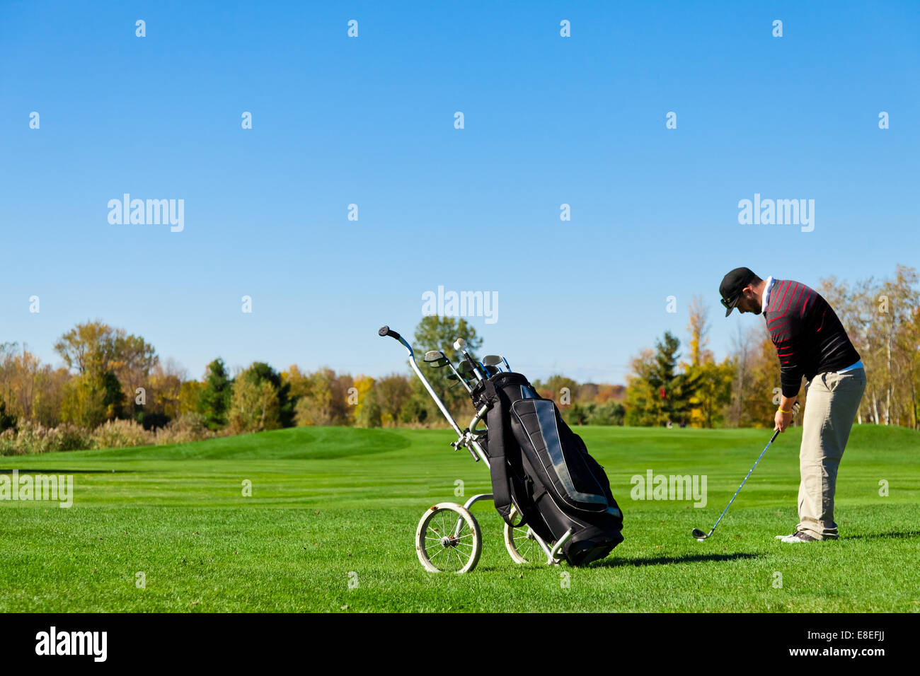Young sportsman playing golf outdoors hi-res stock photography and ...