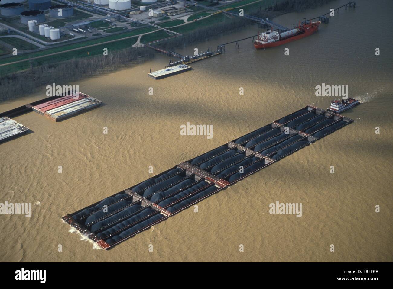 Tugboat Moving Barge in Houston Ship Channel Stock Photo - Alamy