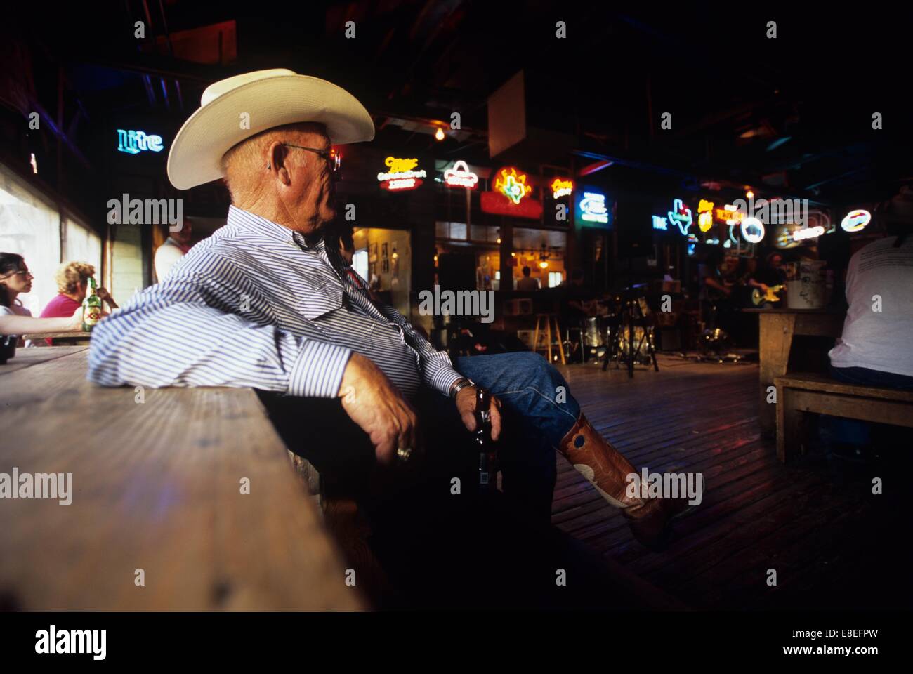 older man at a bar with a drink Stock Photo - Alamy