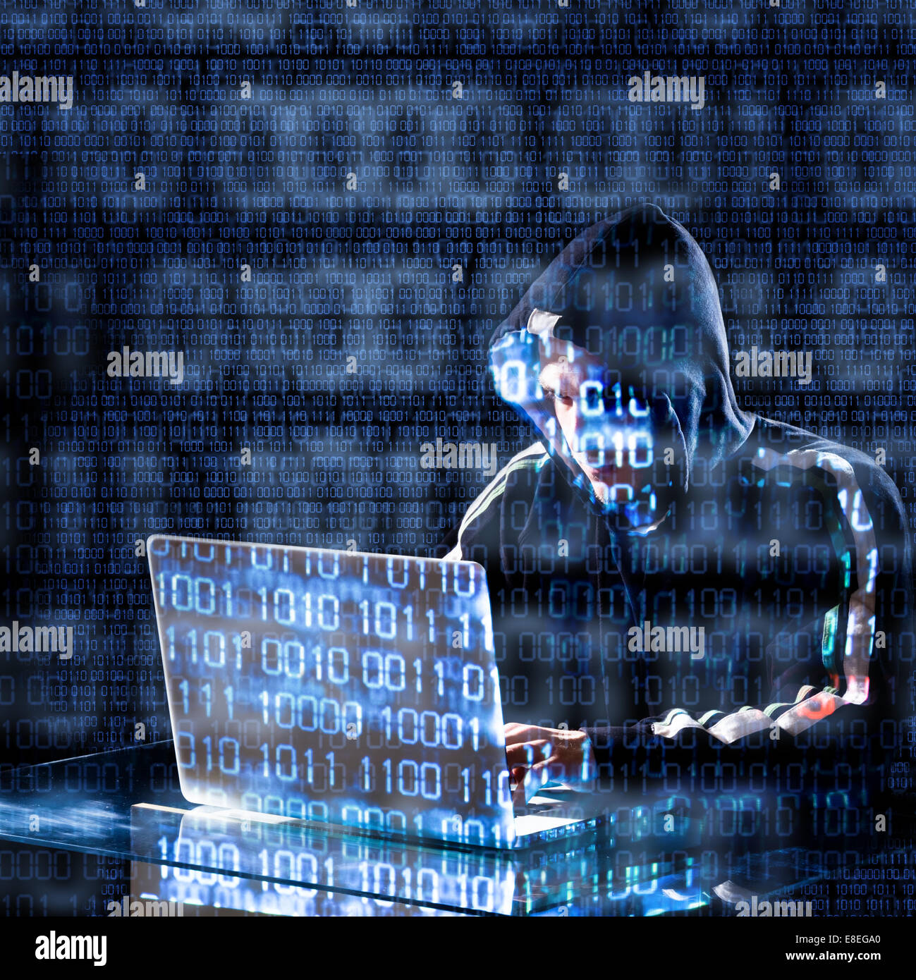 Hacker typing on a laptop with binary code in background Stock Photo - Alamy