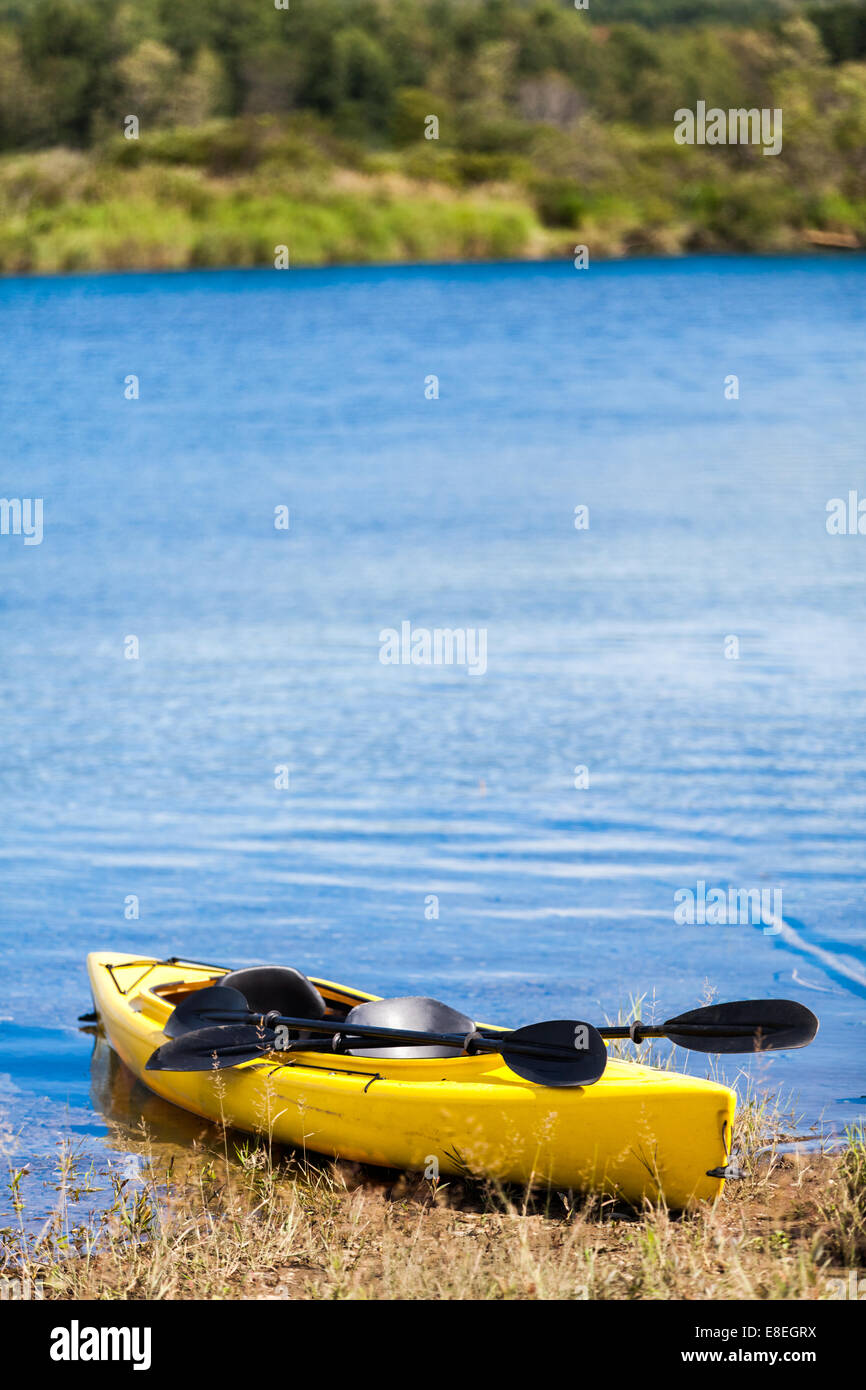 Yellow sports kayak on water hi-res stock photography and images - Alamy