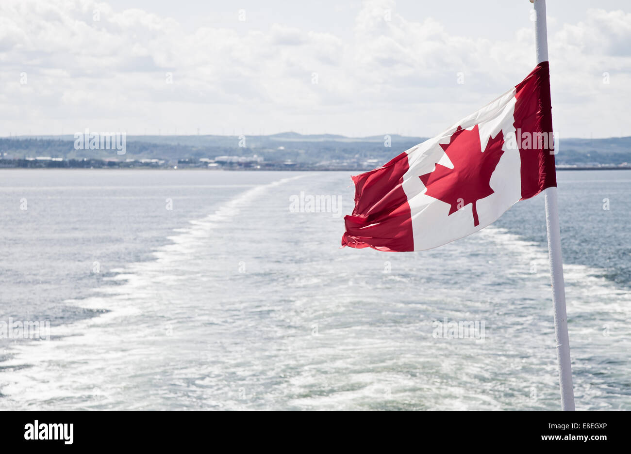 View of the sea and the flag of Canada Stock Photo - Alamy