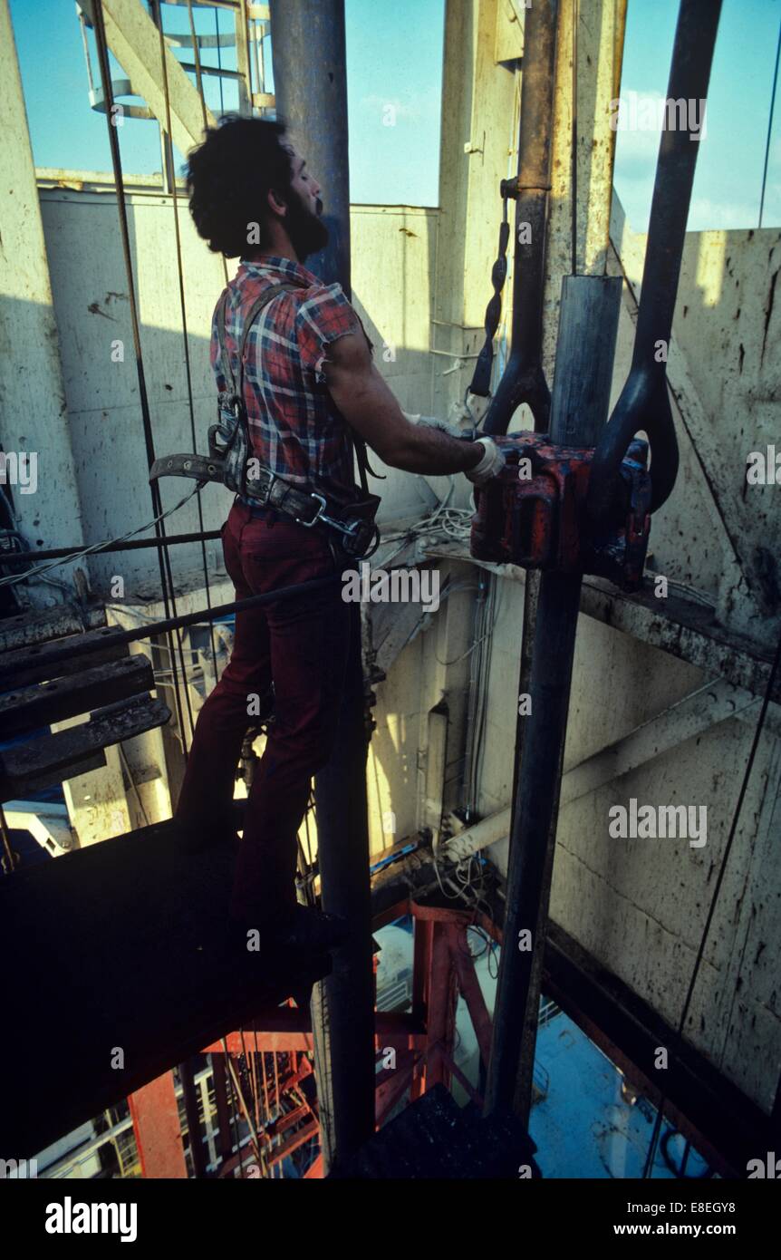 Offshore Oil Rig Worker Handling Drill Pipe in Derrick Stock Photo ...
