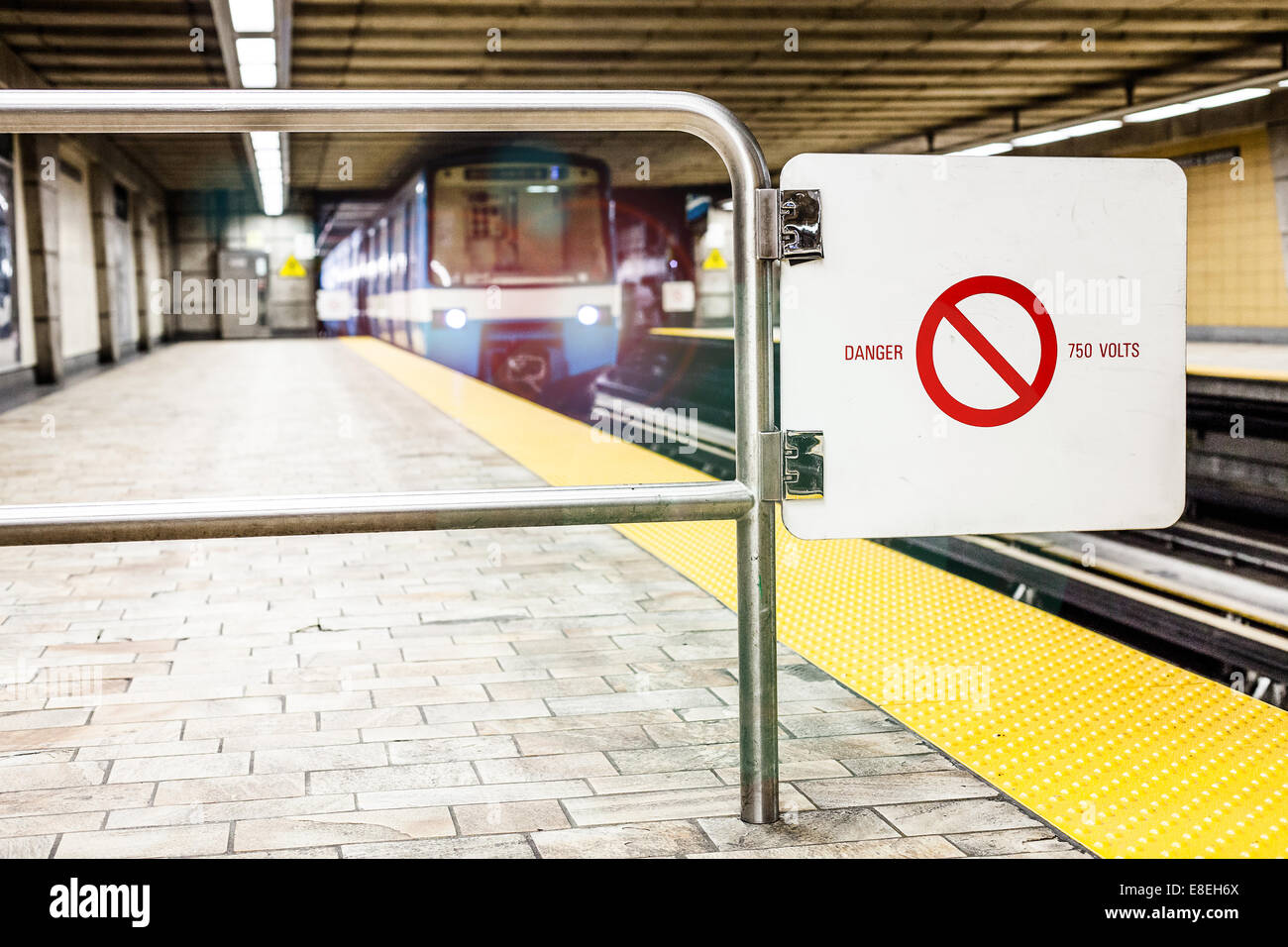 Moving subway train and Motion blur with Safety Interdiction Sign ...