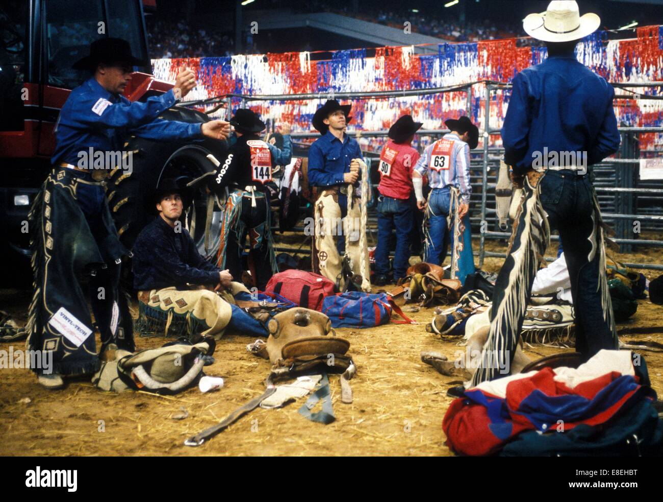 men organizing equipment at the Houston rodeo Stock Photo - Alamy