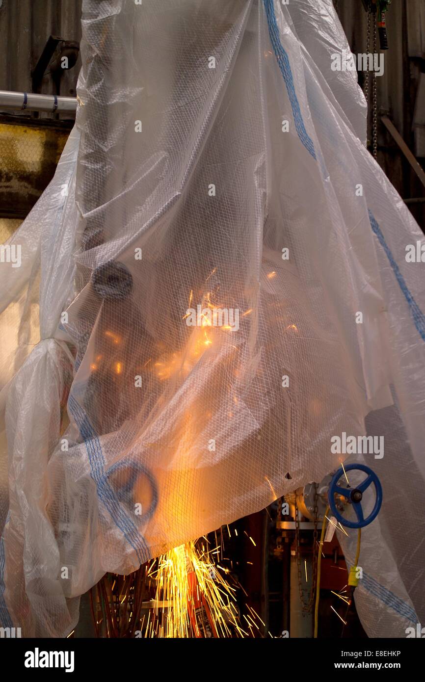 Oil refinery grinding pipe hi-res stock photography and images - Alamy