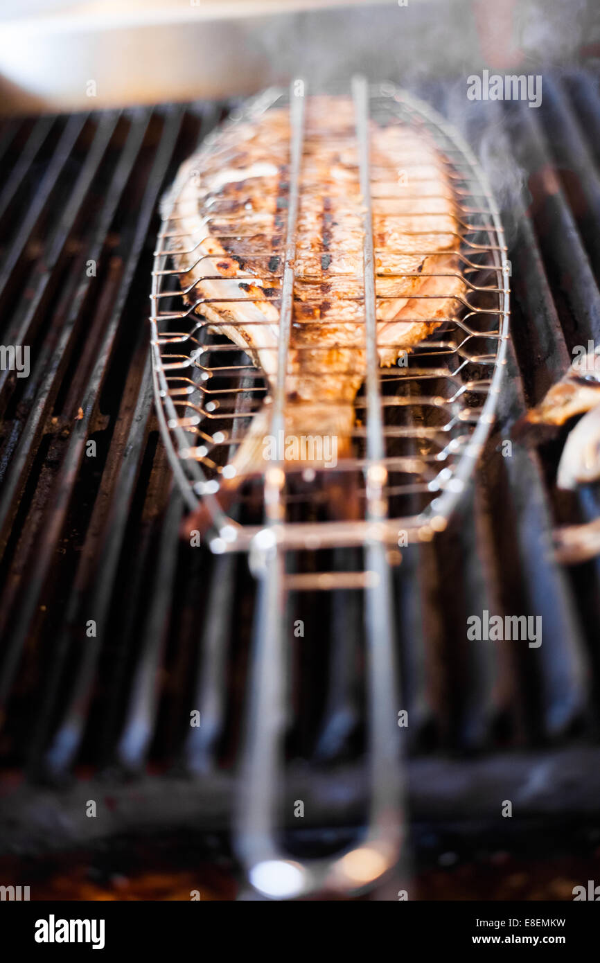 Fish on the grill in a Portugese Restaurant Stock Photo - Alamy