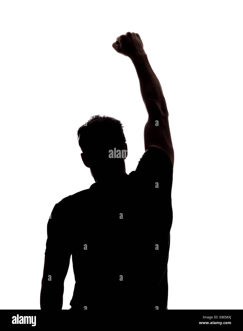 Fist in the air in silhouette isolated over white background Stock ...