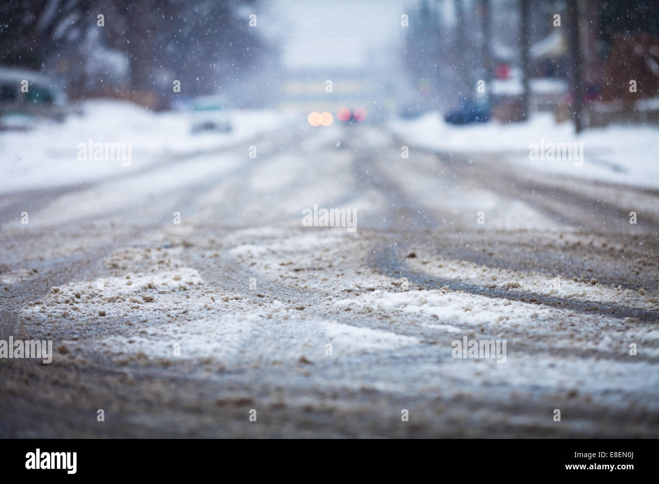 Snow-covered road, the marks of wheels Stock Photo - Alamy