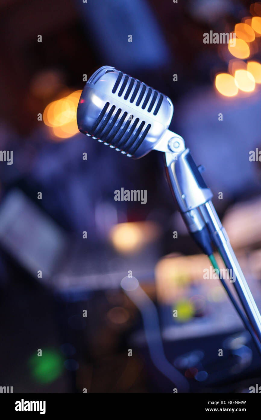 This is a vintage microphone with a DJ Table in the background. I shot ...