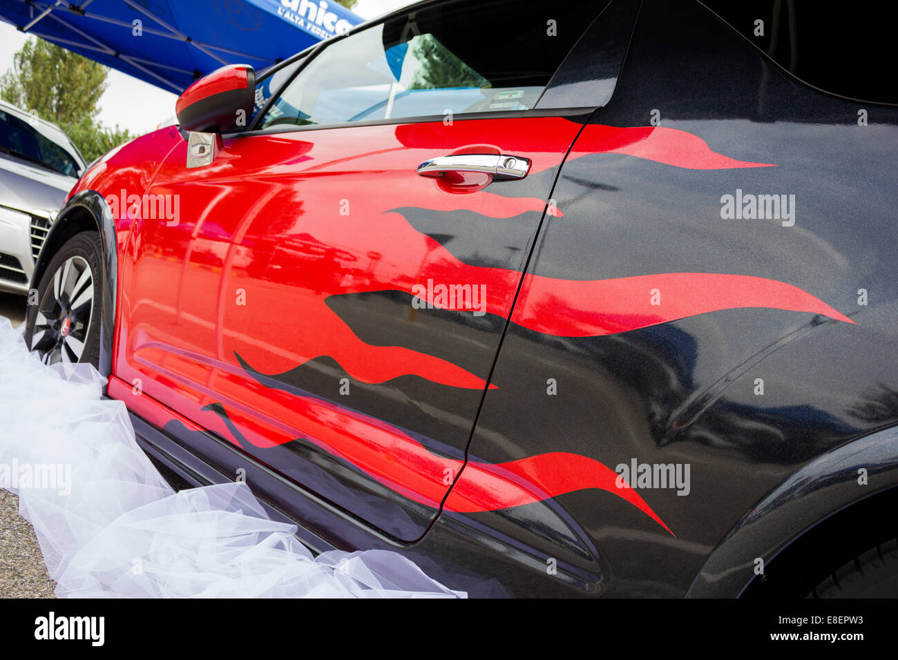 The display of cars with flashy body works and interiors excellently ...