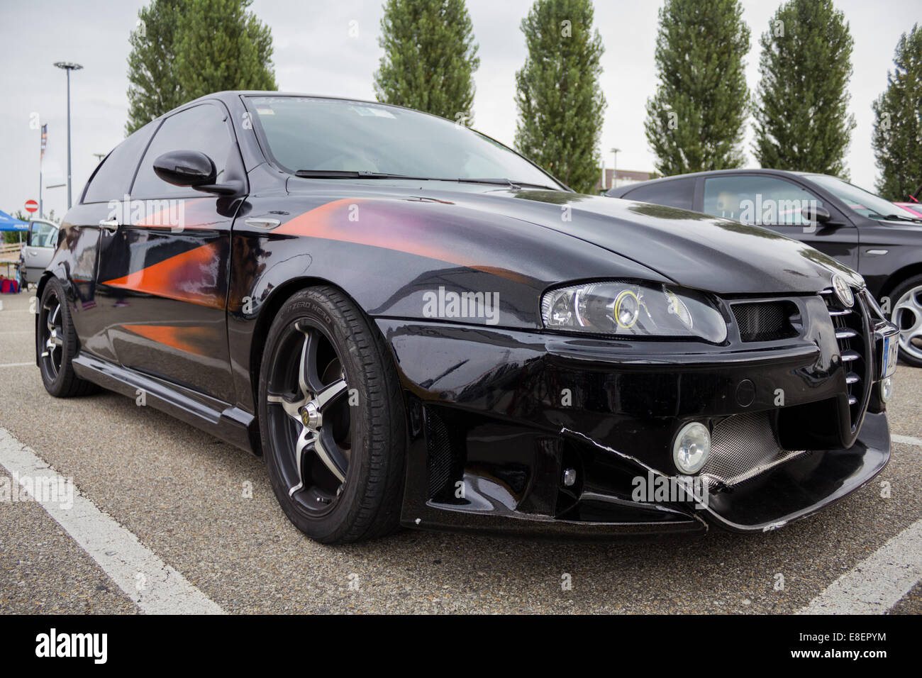 The display of cars with flashy body works and interiors excellently ...