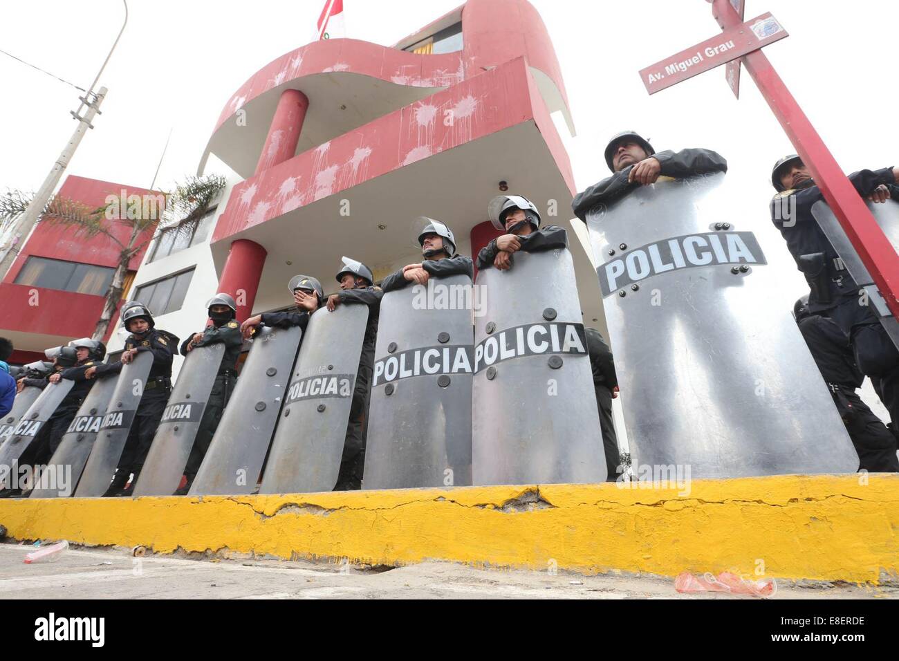 Lima, Peru. 6th Oct, 2014. Policemen guard during a protest of ...