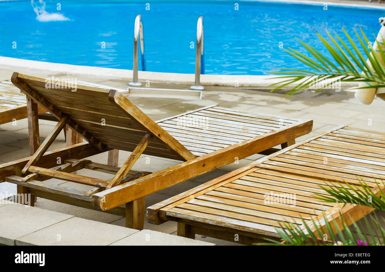 Deckchairs at the pool Stock Photo - Alamy