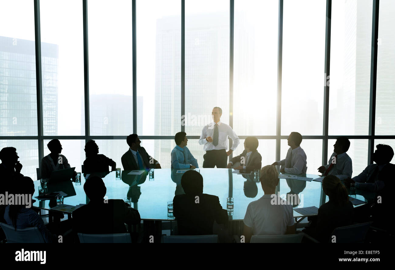 The leader of the business people giving a speech in a conference room ...