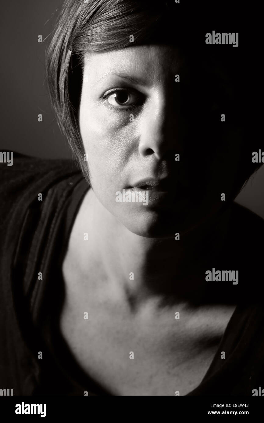 Low Key Photo of 30s Woman Stock Photo - Alamy