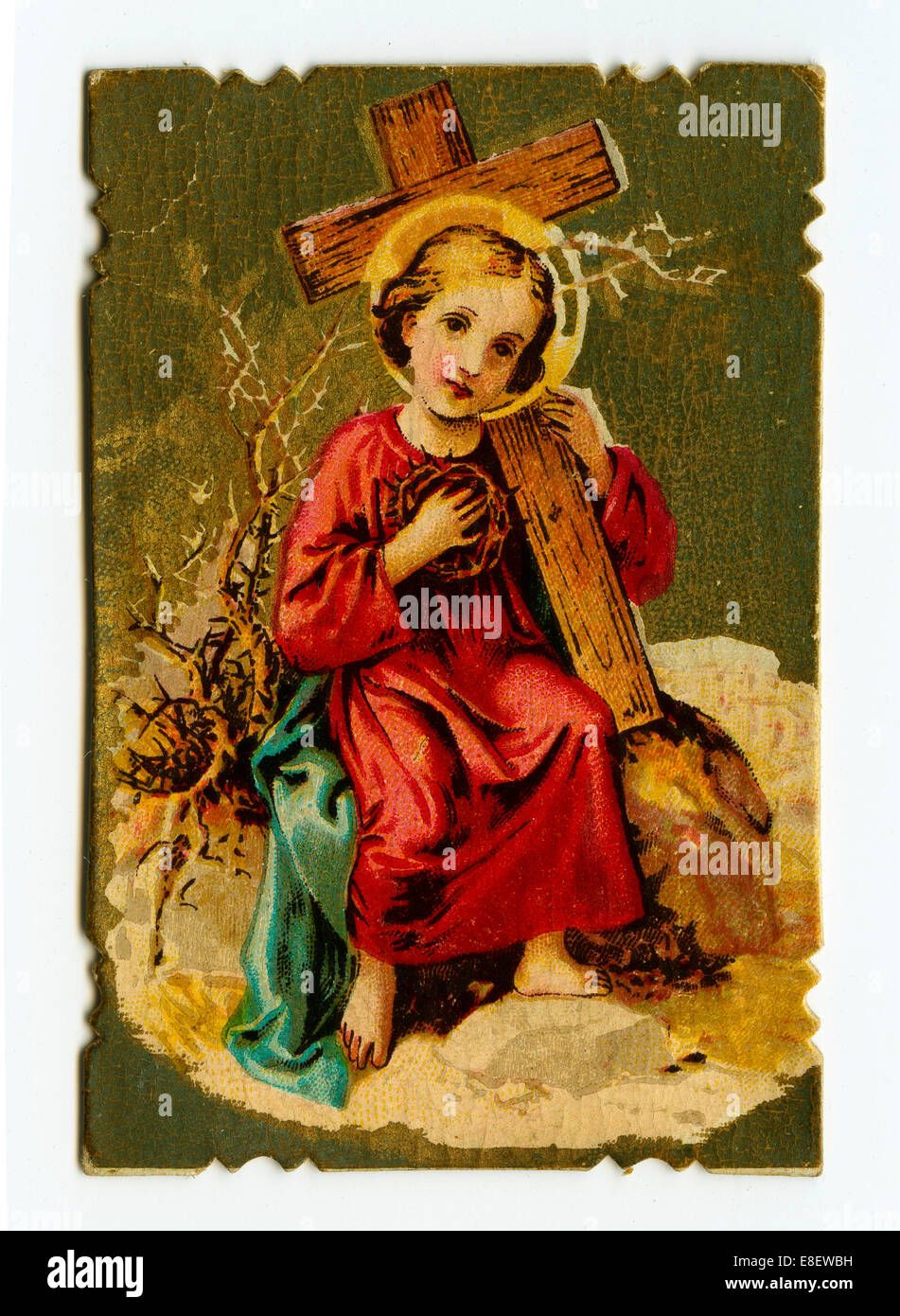 Baby Jesus holding a cross wearing a crown of thorns, devotional image ...