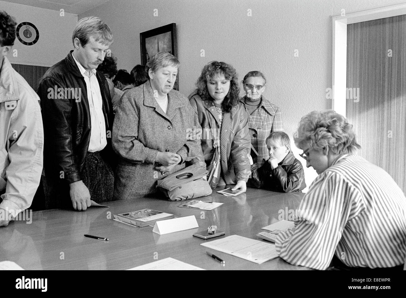 East German citizens travelling, cashing in their welcome money, day of ...
