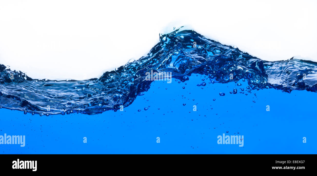 Clean water wave with bubbles over white background Stock Photo - Alamy