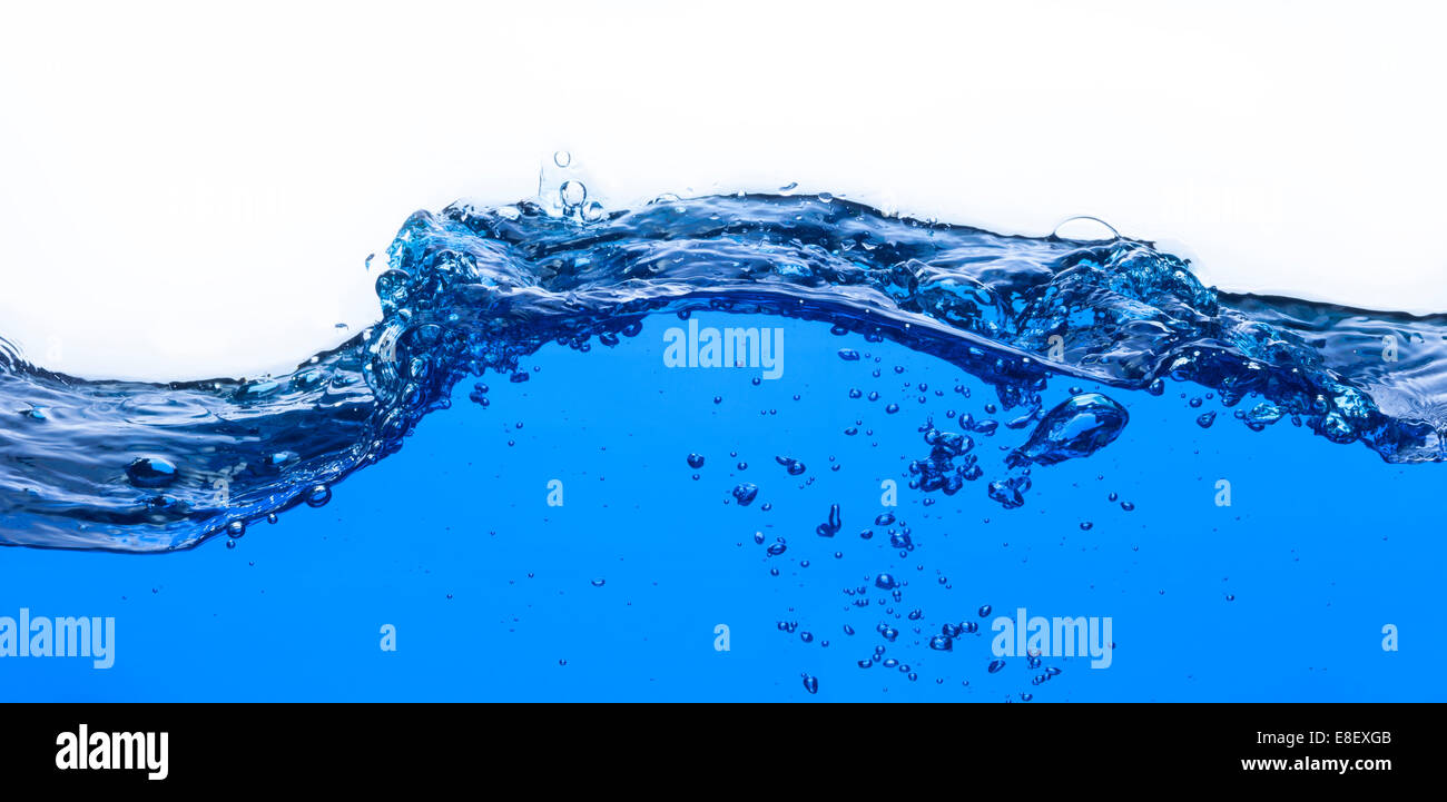 Pure water wave with bubbles over white background Stock Photo - Alamy