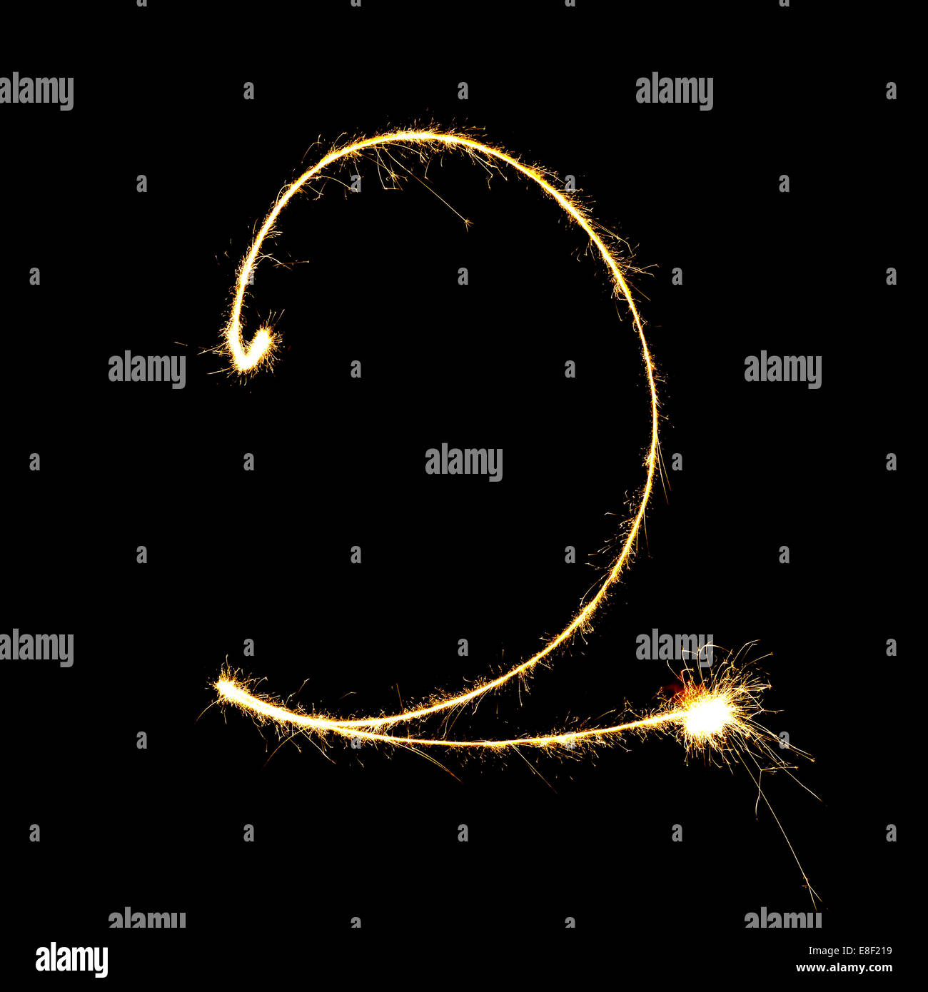burning sparkler stick and writing sparkling text . number two isolated ...