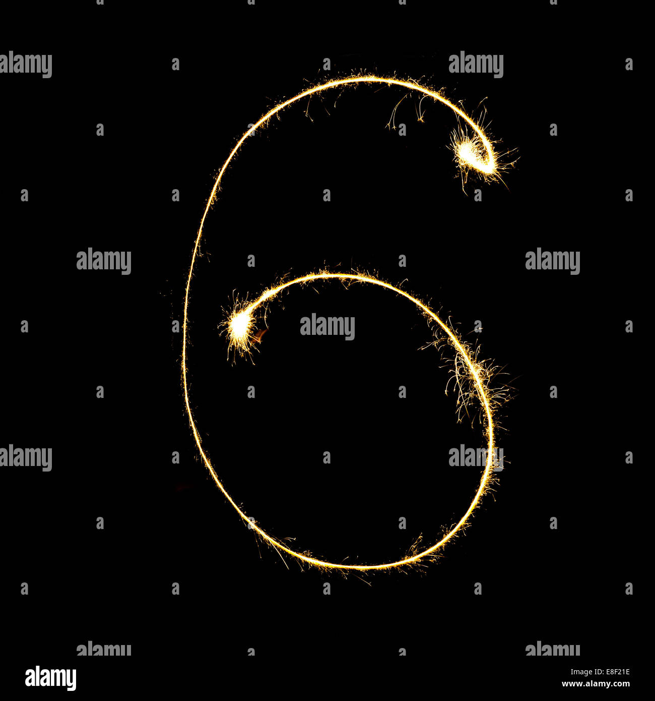 burning sparkler stick and writing sparkling text . number six isolated ...