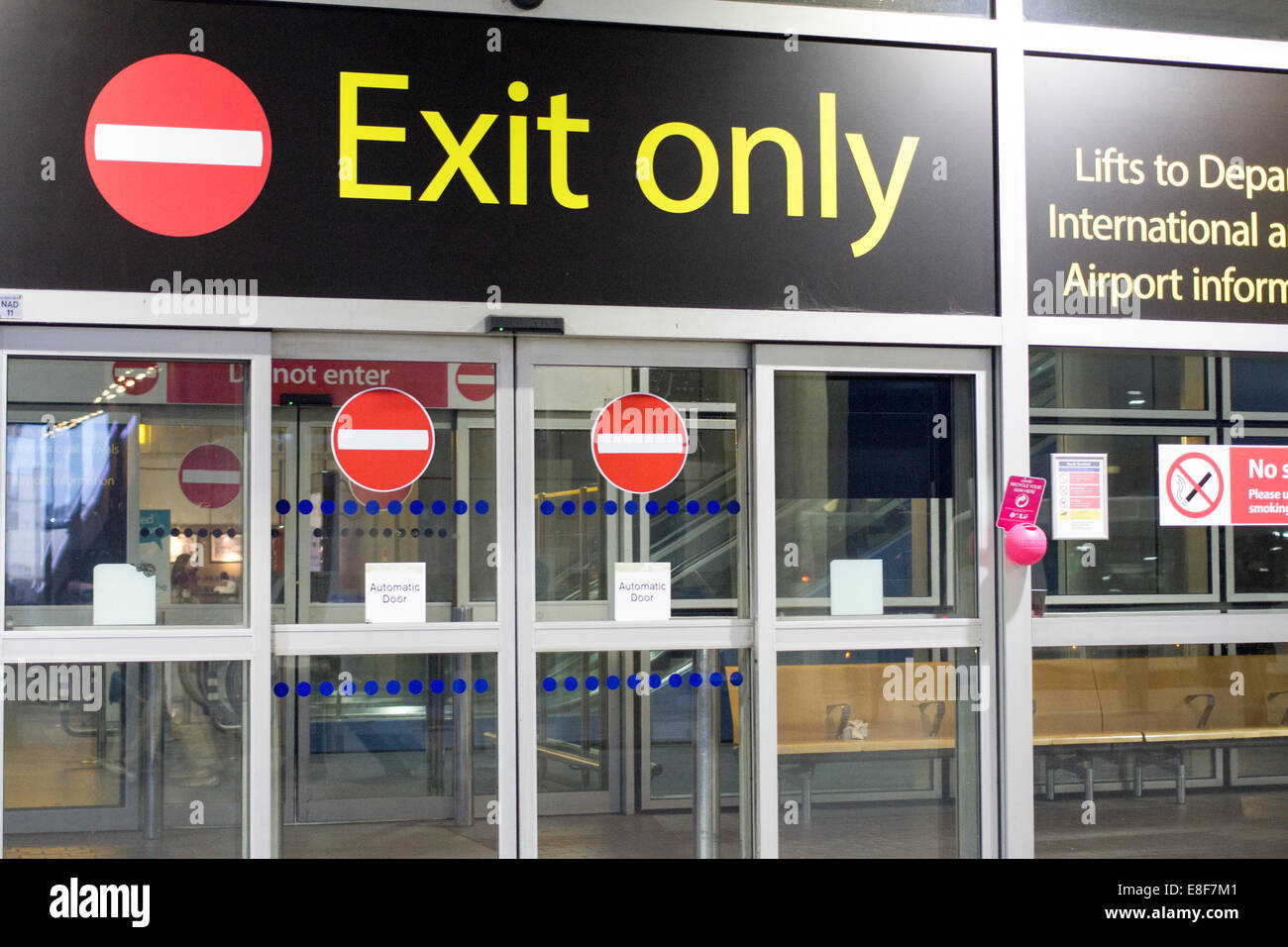 Exit door from London Gatwick North terminal Stock Photo - Alamy