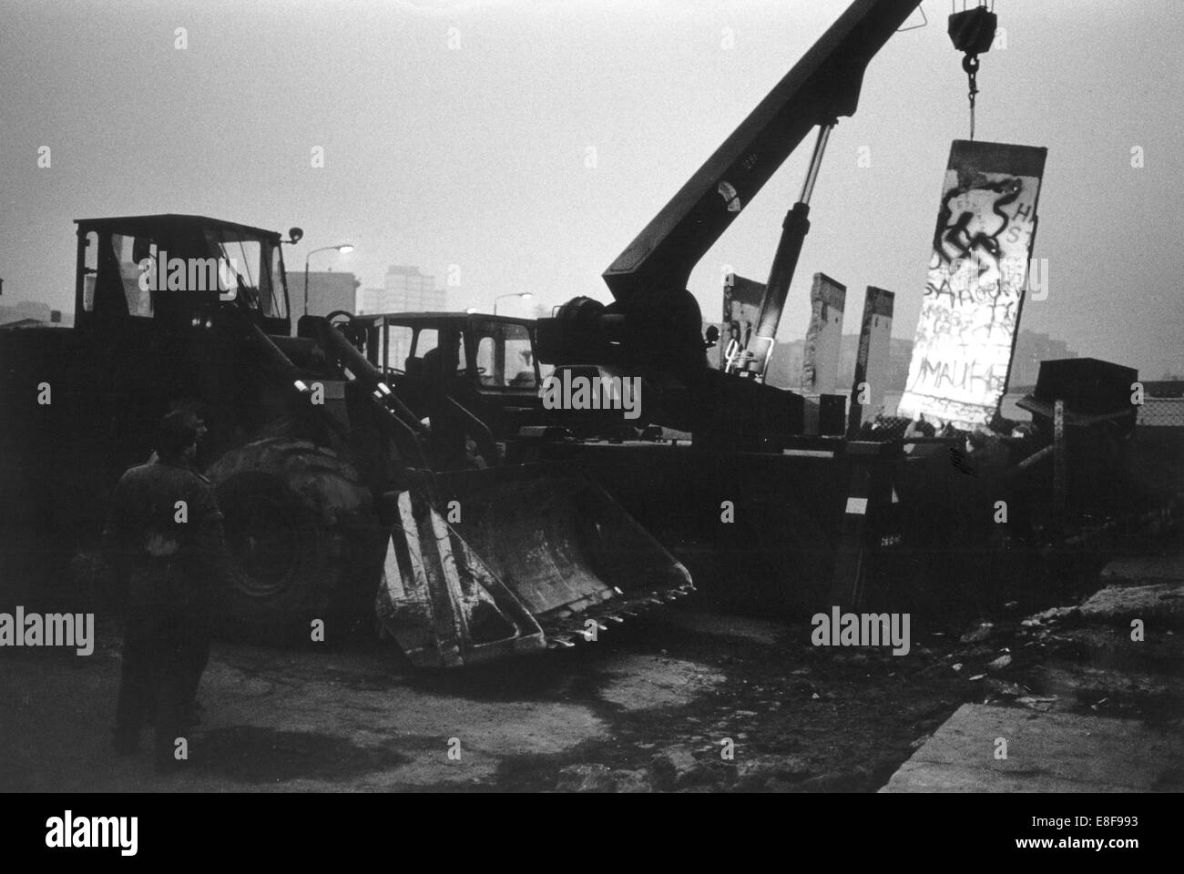 GDR border forces remove parts of the Berlin Wall on 12 November 1989 ...