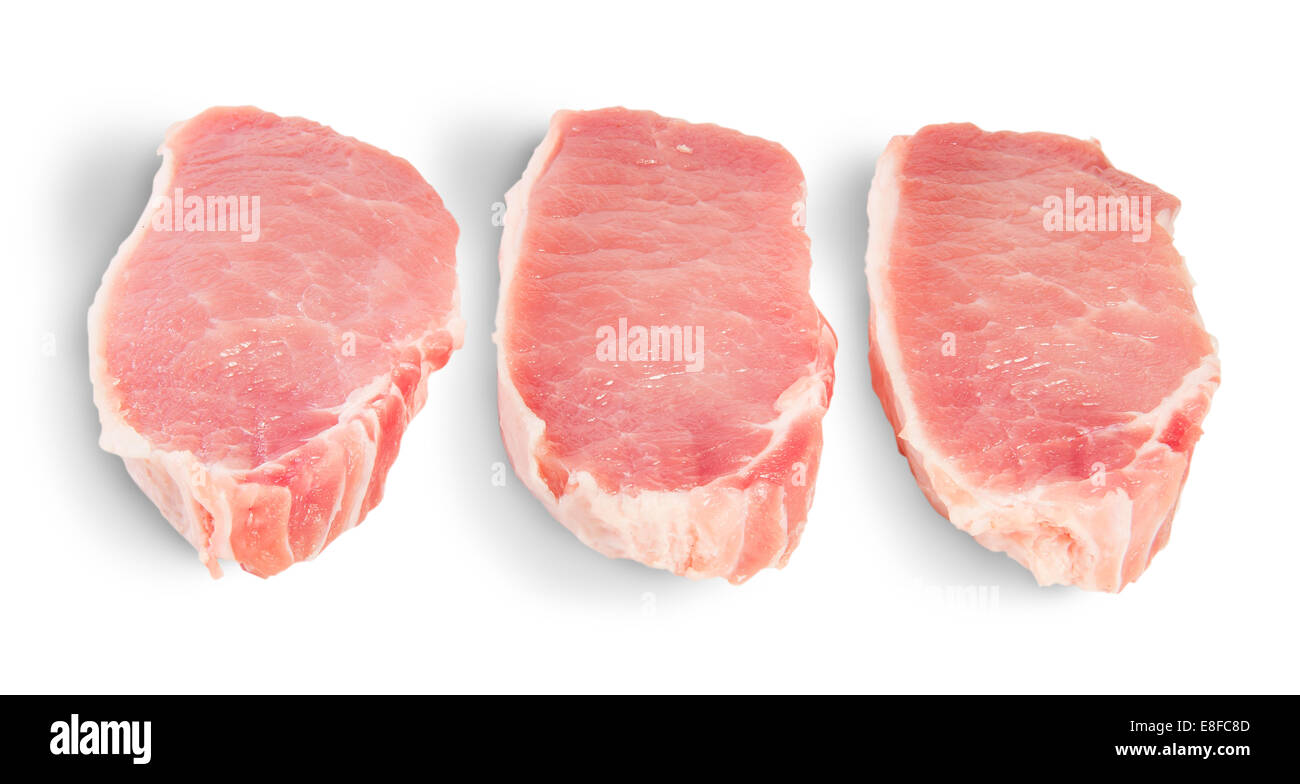 Three Pieces Of Raw Pork Isolated On White Background Stock Photo - Alamy