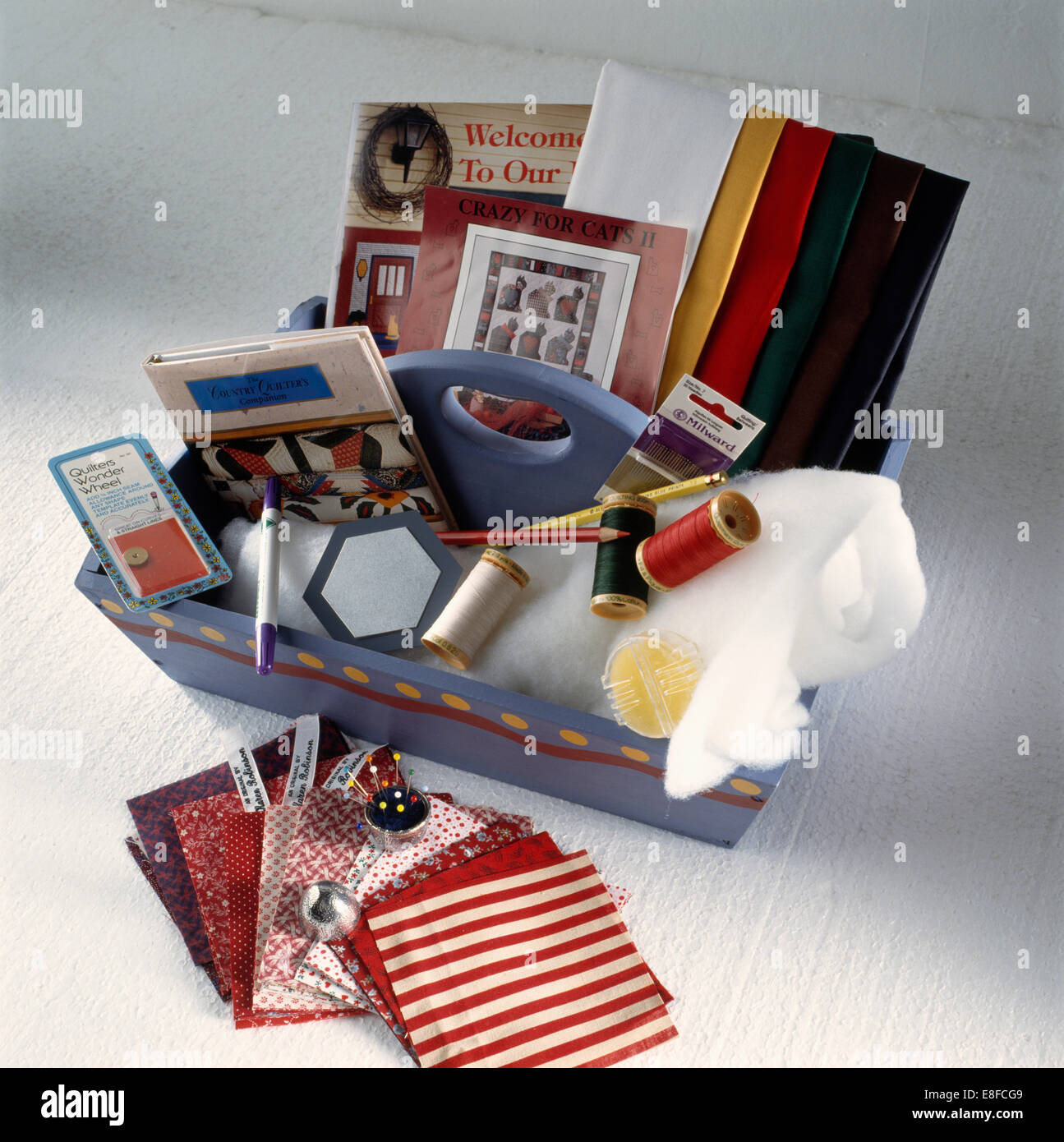 Close-up of blue painted box holding craft making materials Stock Photo ...