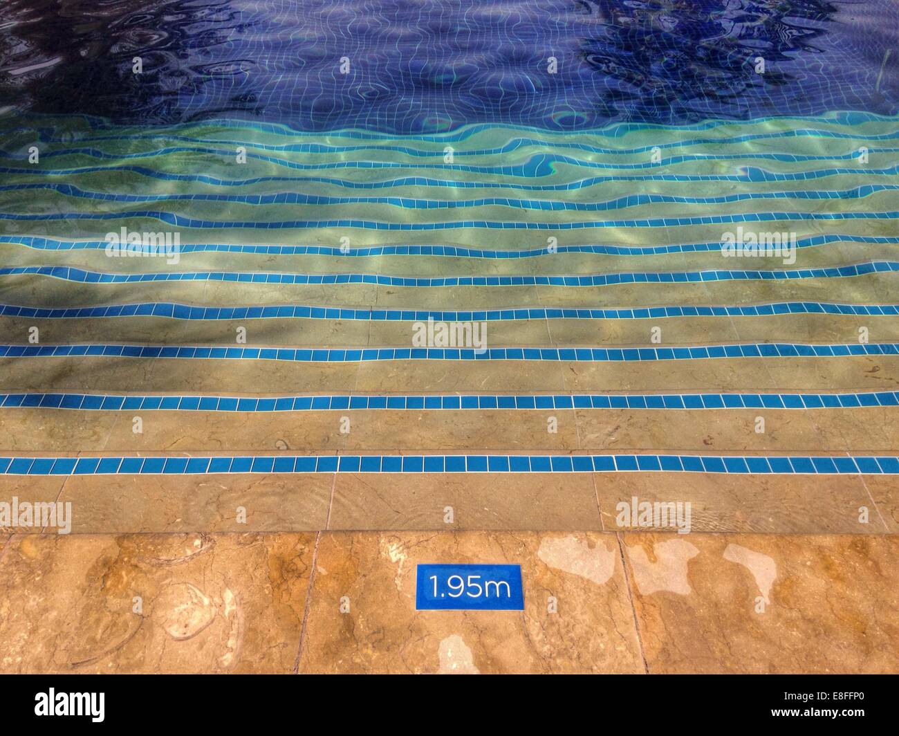 Swimming pool steps Stock Photo - Alamy