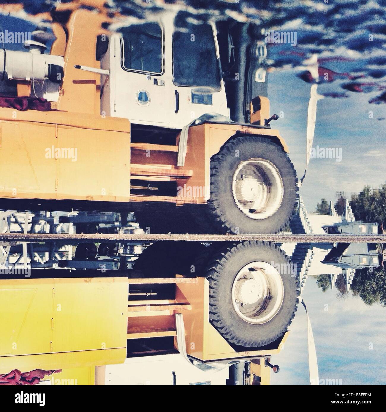 Reflection Of A Truck in a puddle Stock Photo - Alamy