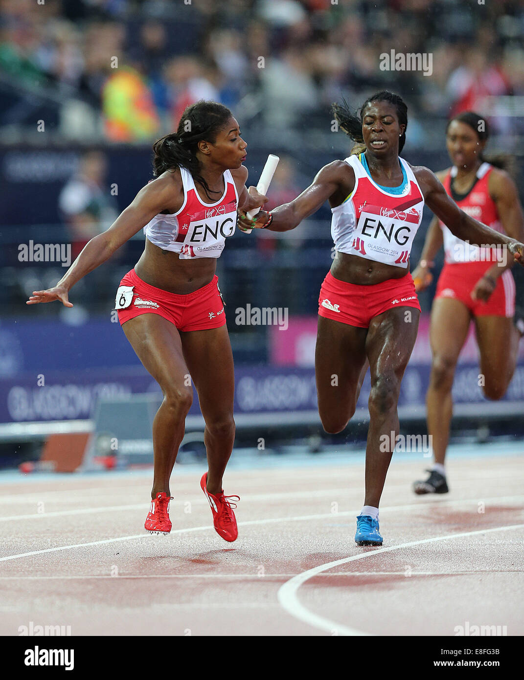 Christine Ohuruogu (ENG) hands the baton to Shana Cox (ENG). England ...