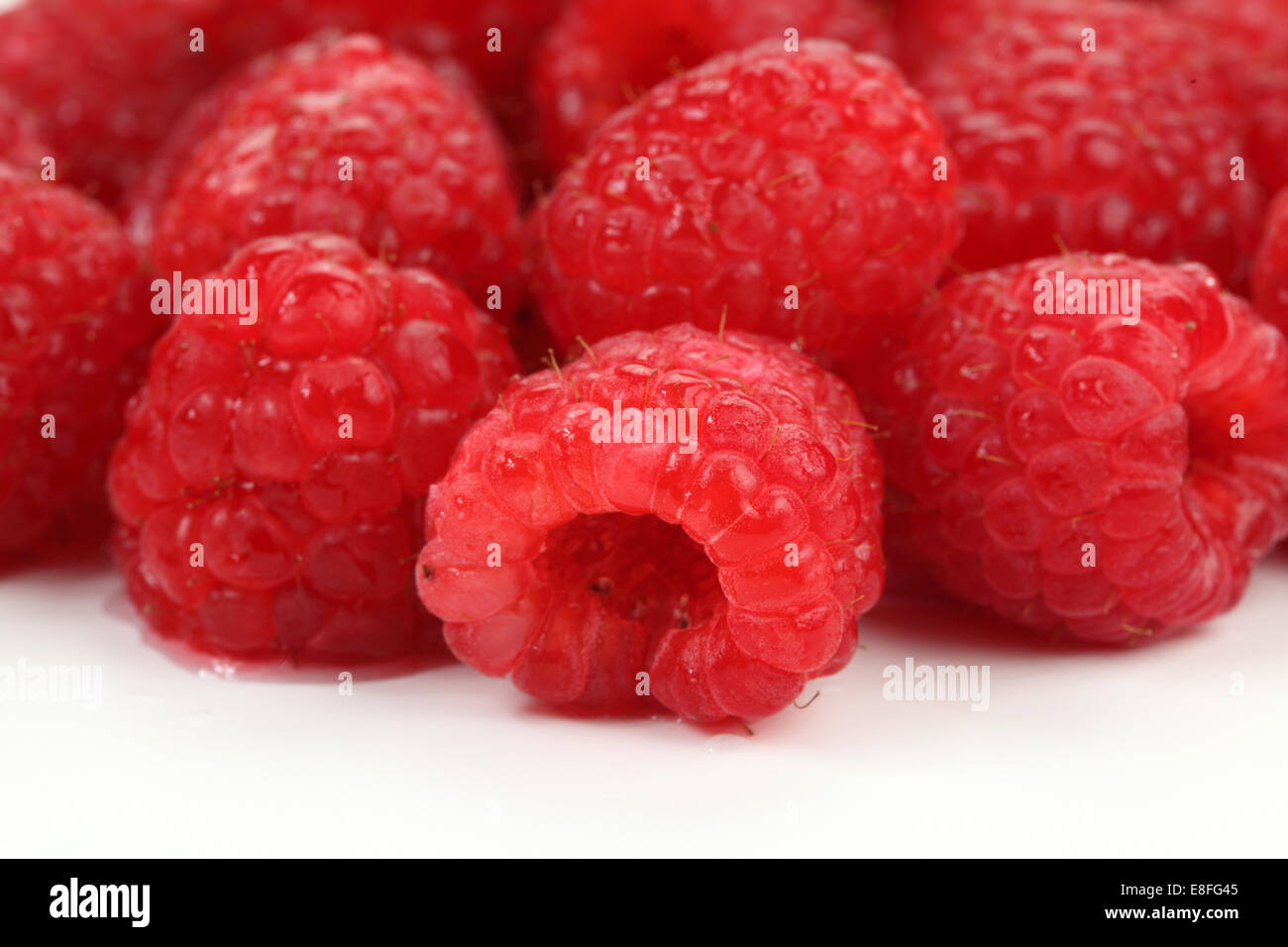 Sweet raspberry isolated on white background Stock Photo - Alamy