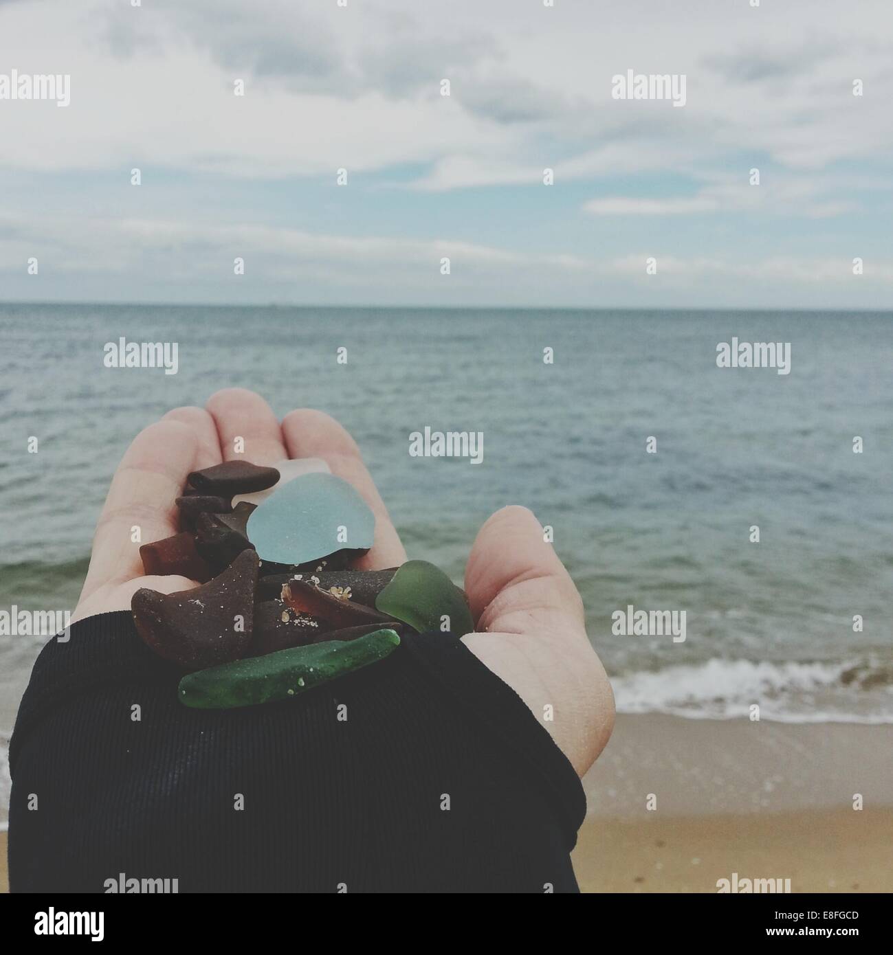 Collecting pebbles beach hi-res stock photography and images - Alamy