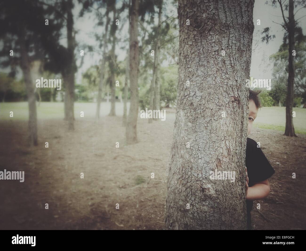 Children Hiding Outside Stock Photos & Children Hiding Outside Stock ...
