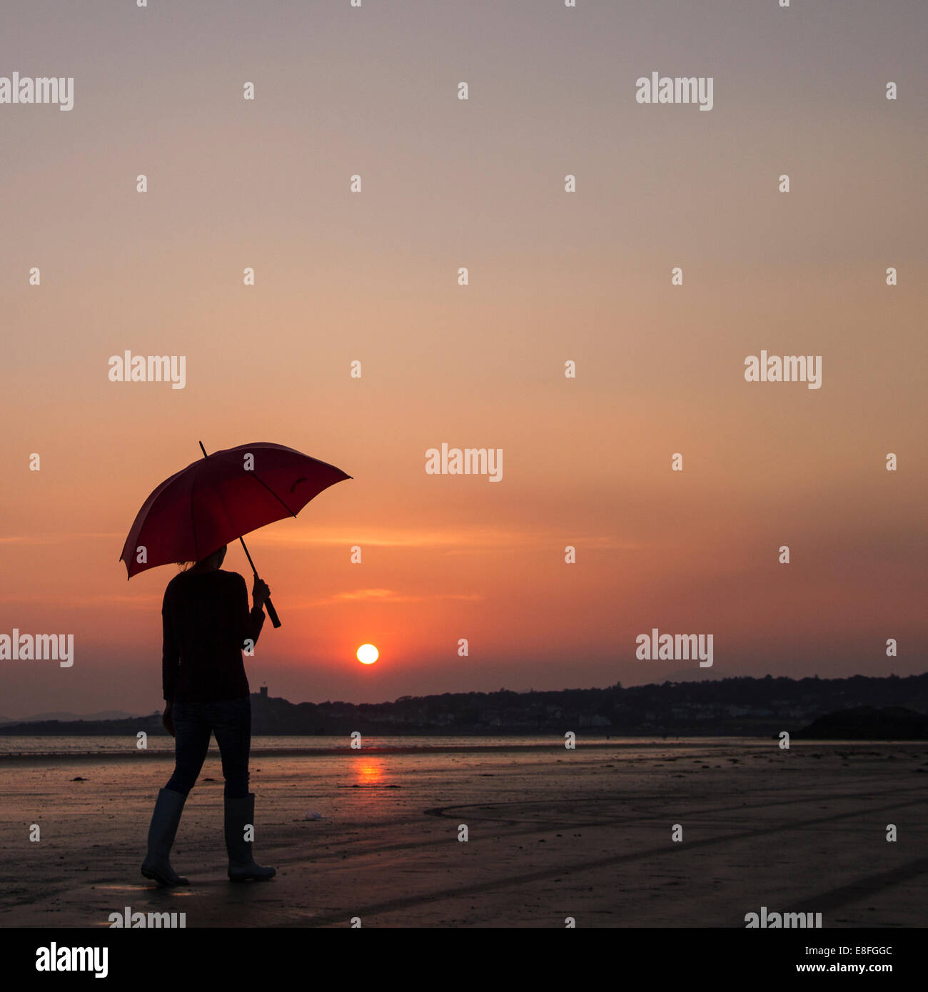 Person with an umbrella hi-res stock photography and images - Alamy