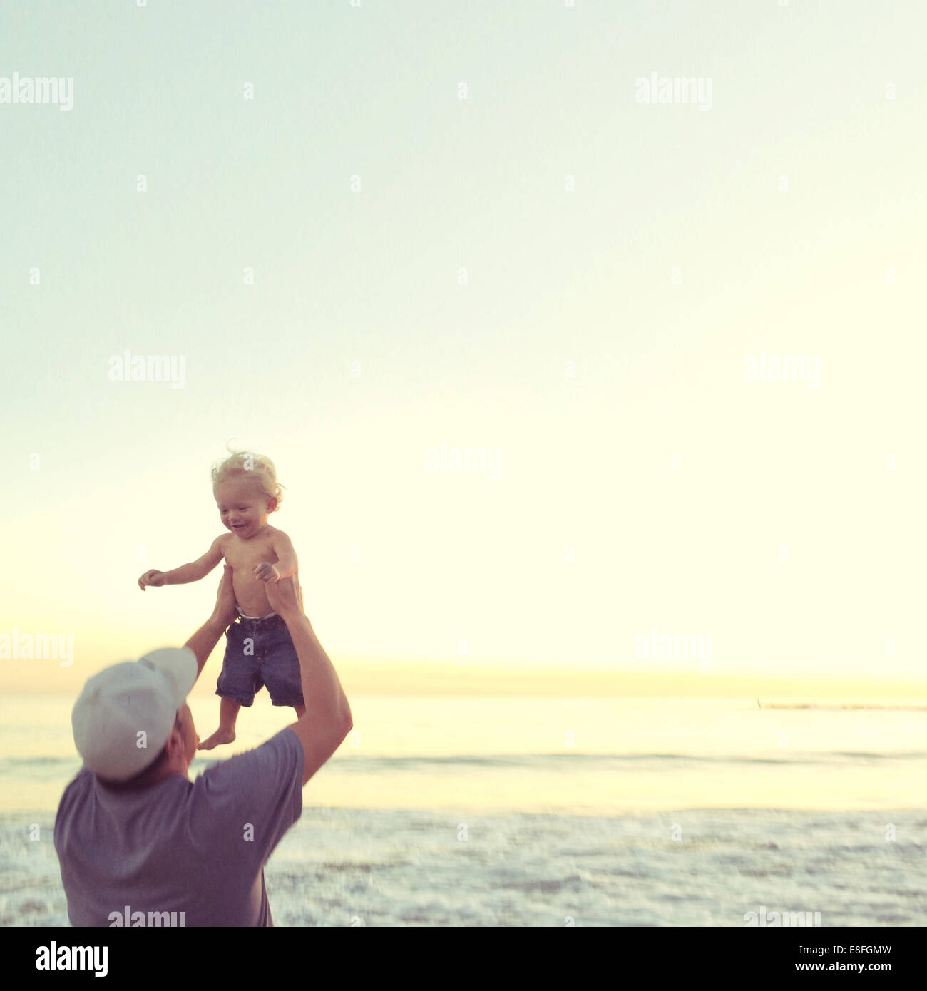 Father playing with baby in the water hi-res stock photography and ...