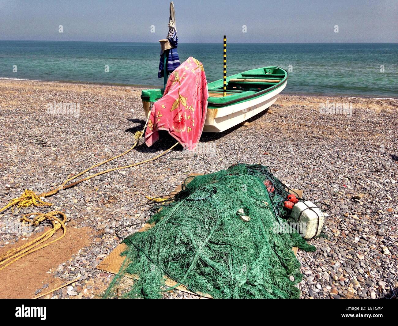 Fishing boat on the beach, Muscat, Oman Stock Photo - Alamy