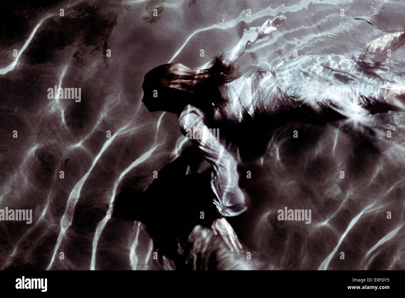 Fully clothed in water hi-res stock photography and images - Alamy