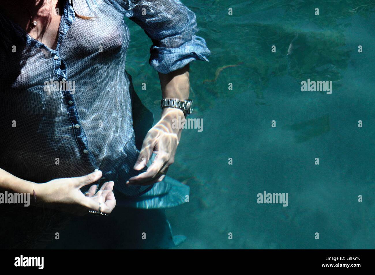 Fully clothed in water hi-res stock photography and images - Alamy