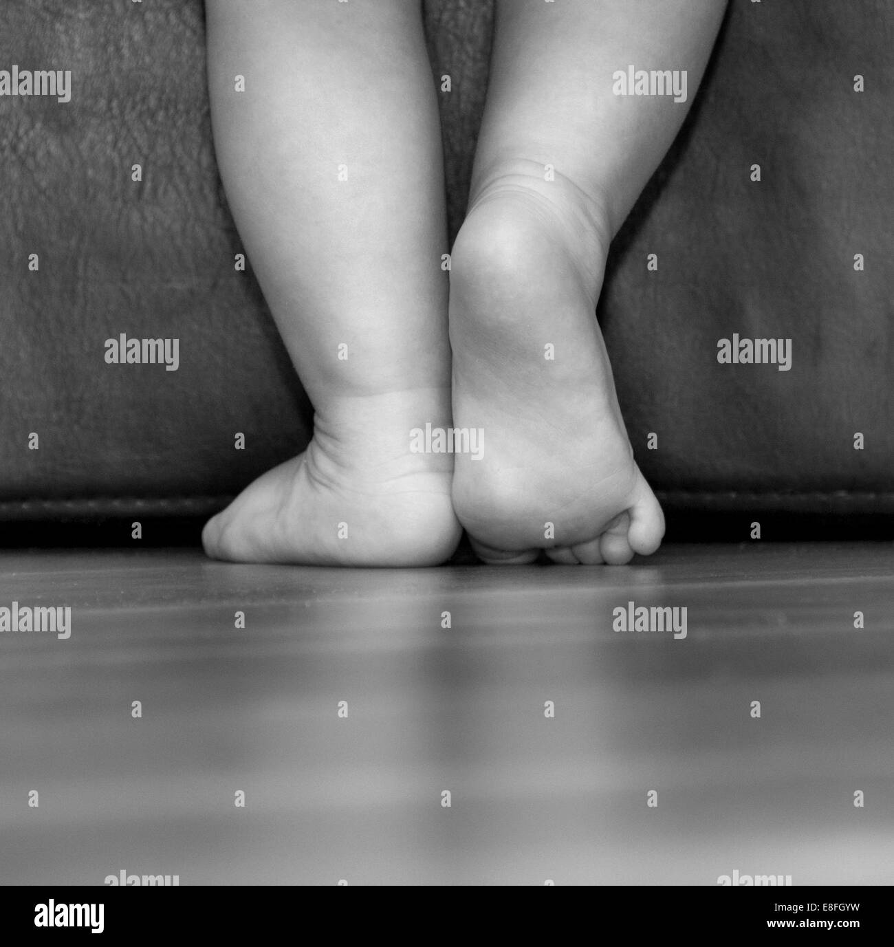 Rear view close-up of child's legs Stock Photo - Alamy