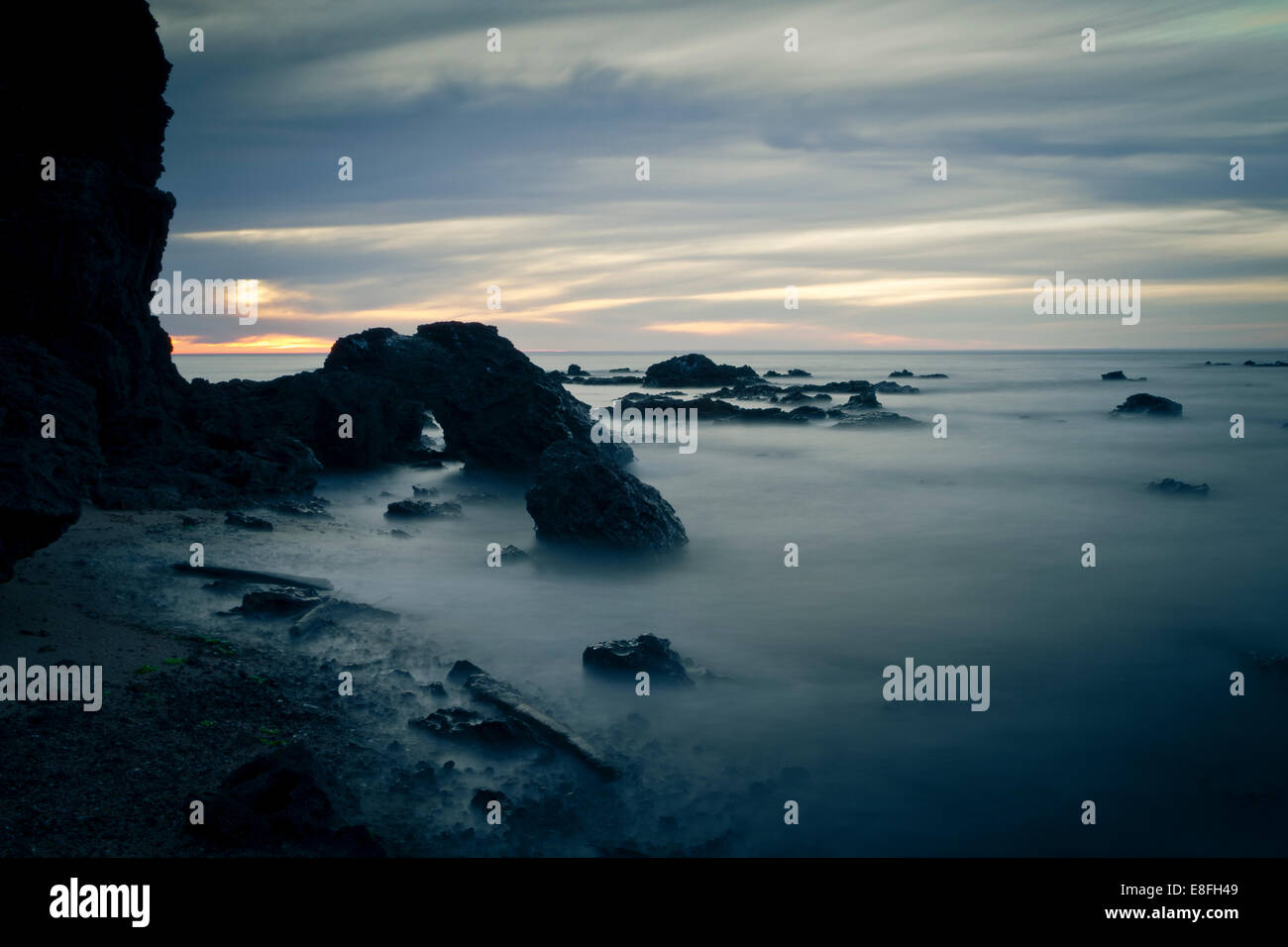 Australia, Victoria, Melbourne, Frankston, Ocean rocks at sunset Stock ...