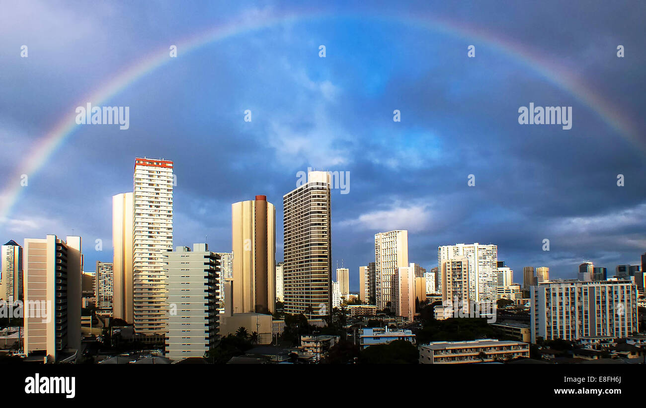 Rainbow over city skyline, Honolulu, Hawaii, United States Stock Photo ...