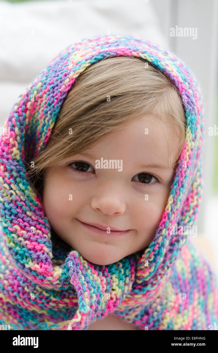 Portrait of a girl in colorful scarf Stock Photo - Alamy
